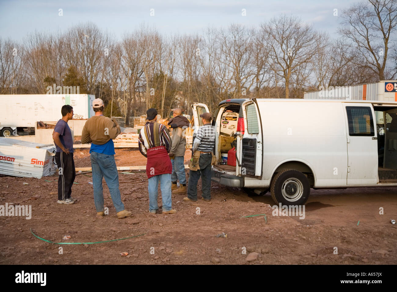Immigrant Construction Worker Finishing Work Stock Photo - Alamy