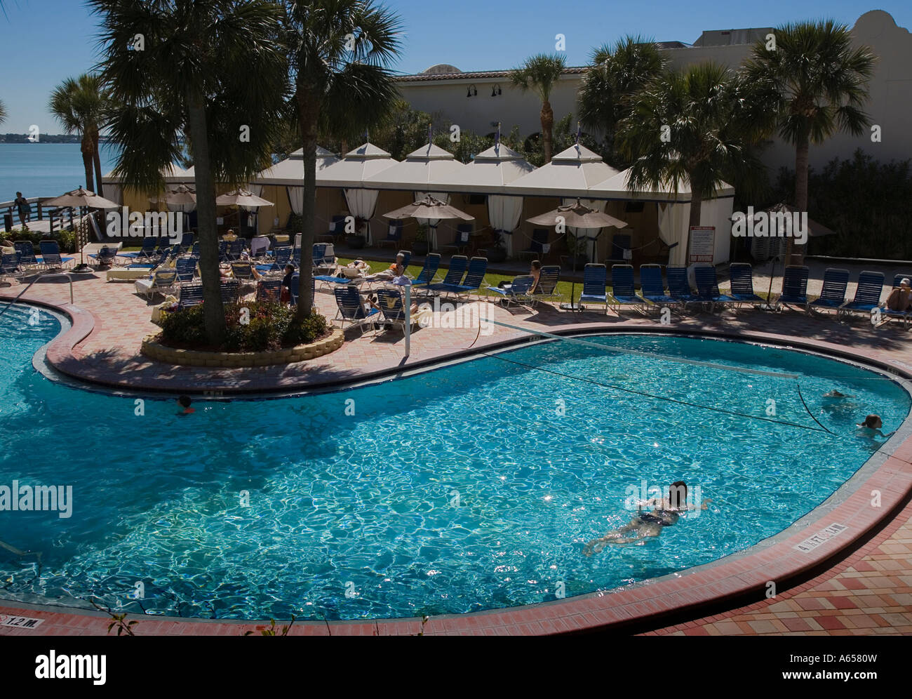 People swimming at a resort Stock Photo - Alamy