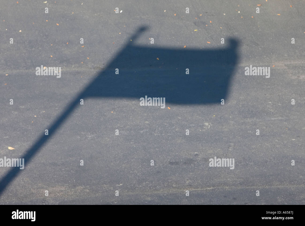 Shadow of a flag on pavement Stock Photo - Alamy