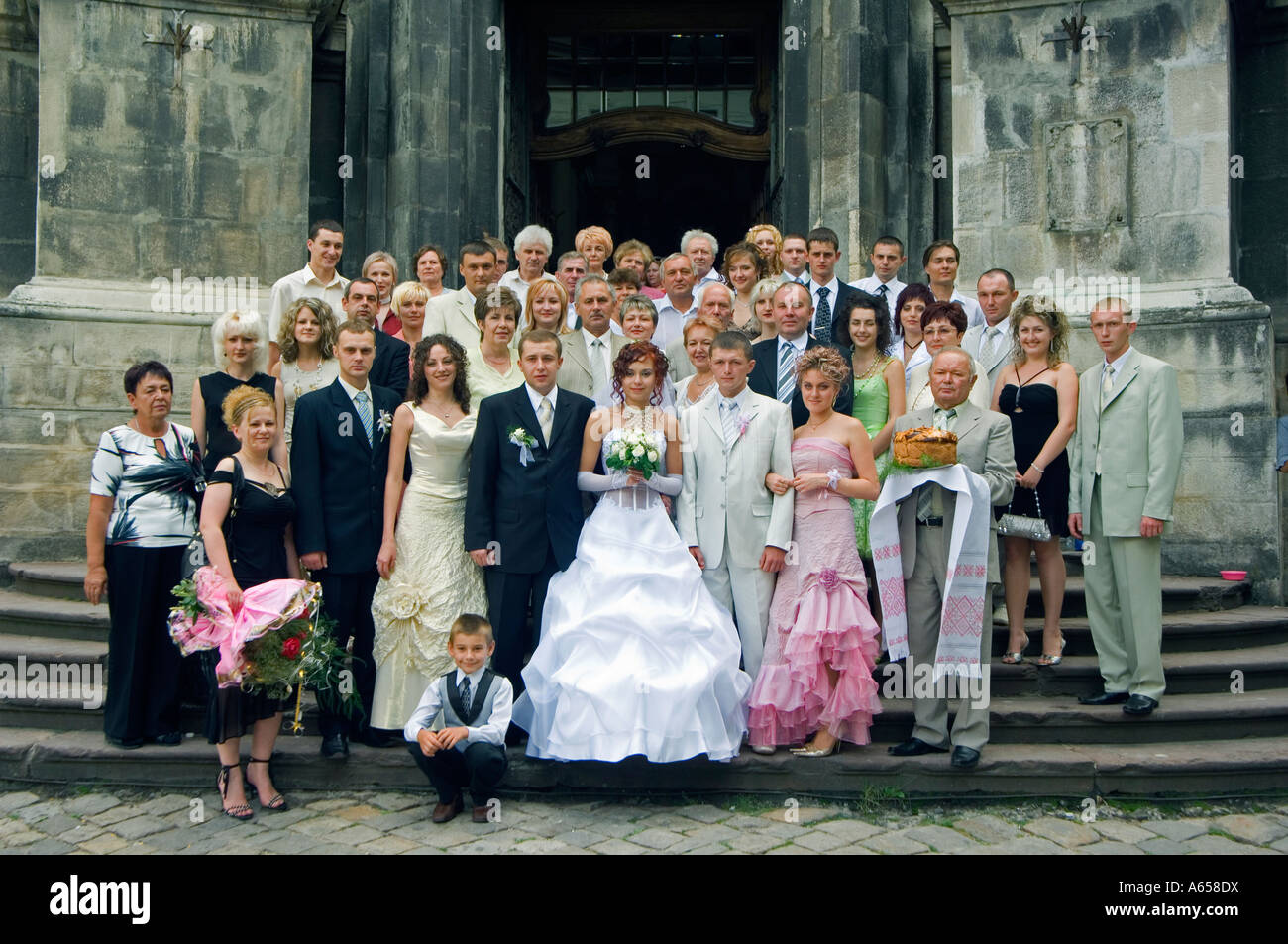 Bride and Groom at Wedding Family Portrait Stock Photo - Alamy