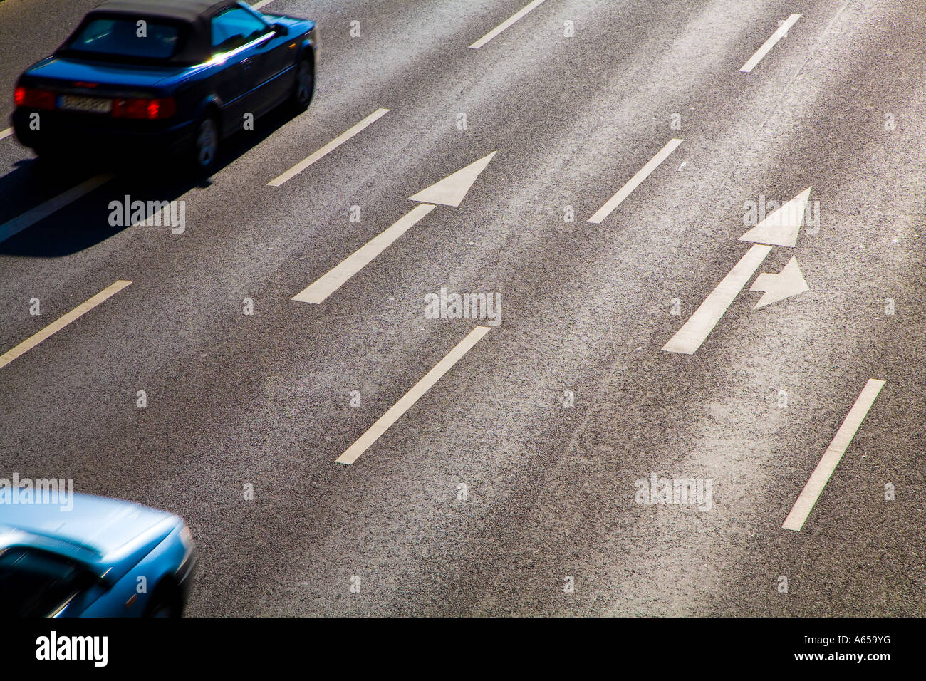 Cars Driving On Road Stock Photo - Alamy