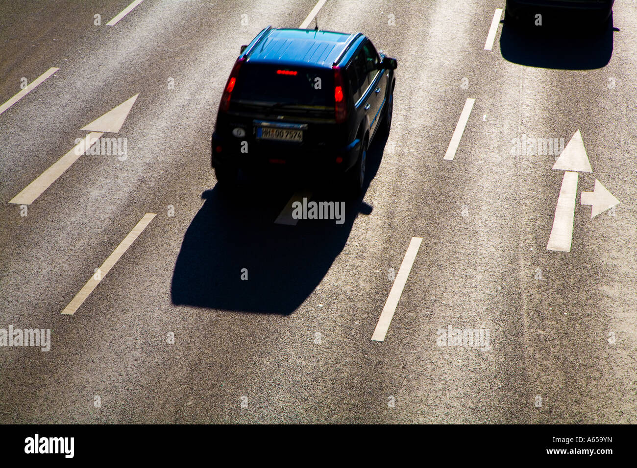 Cars driving on road hi-res stock photography and images - Alamy