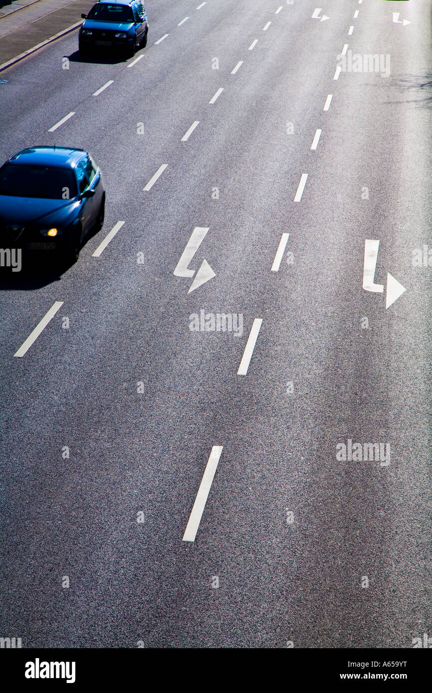 Cars Driving On Road Stock Photo - Alamy