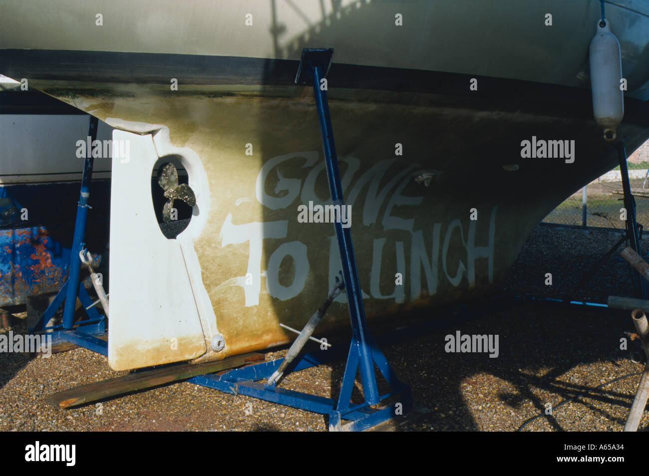 Sailing Boat hull being cleaned Stock Photo - Alamy
