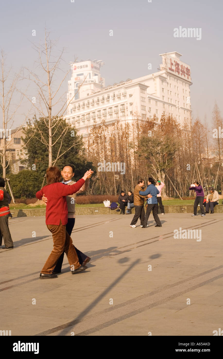 Dance group taking their early morning exercise. Shanghai, Peoples ...