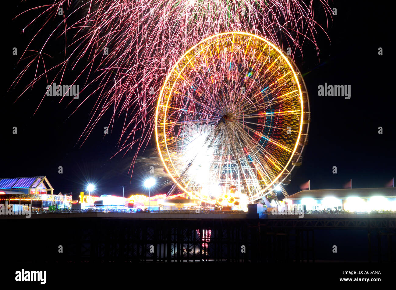 Fireworks exploding over the Ferris wheel on Central Pier,Blackpool ...