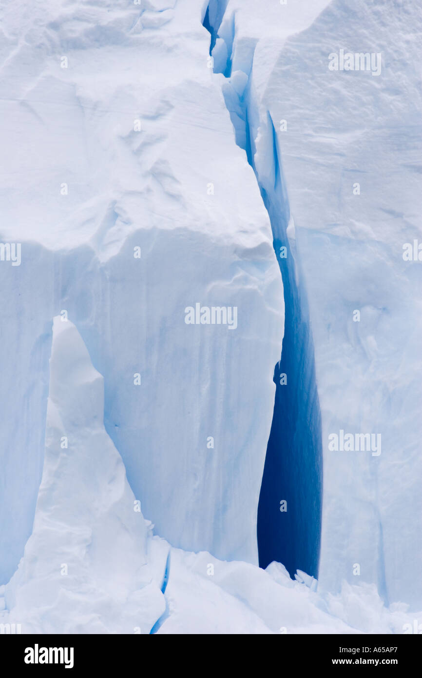 Dark blue rift (fissure) in a glacier face at Almirante Brown ...
