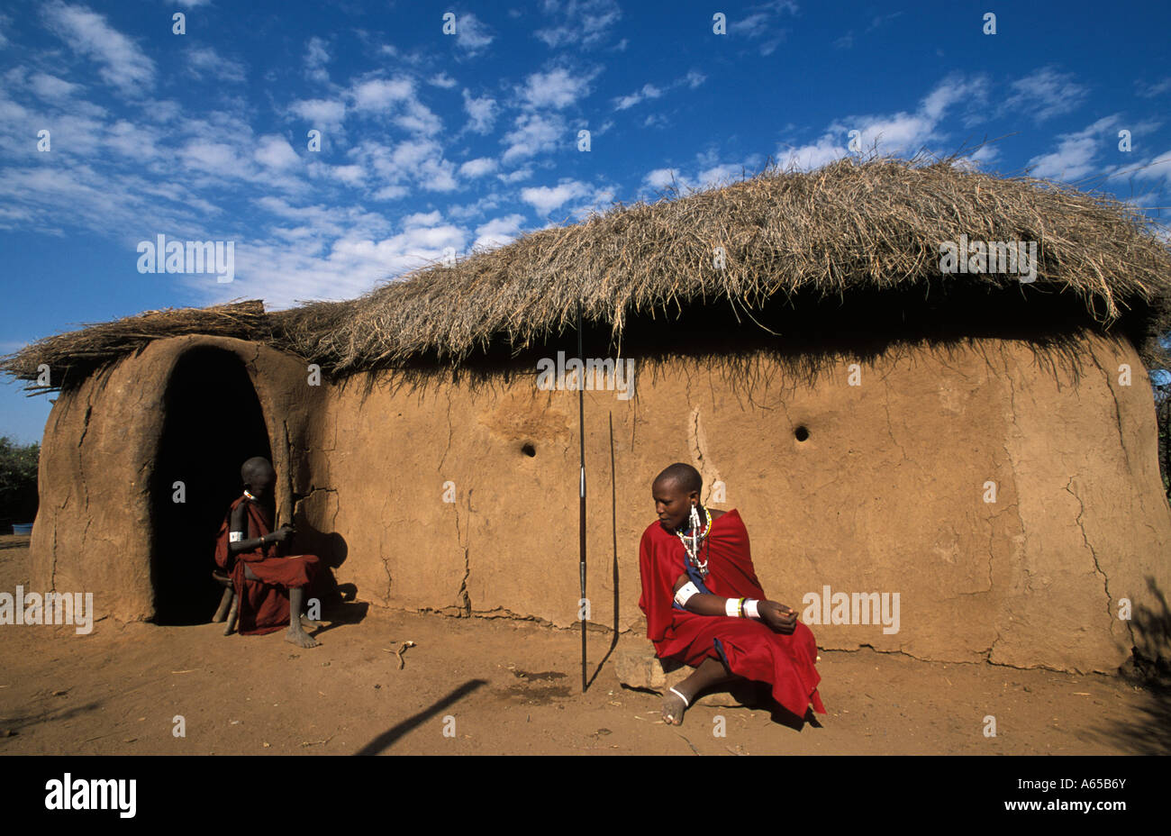Maasai women in front of a traditional homestead Tanzania Stock Photo ...