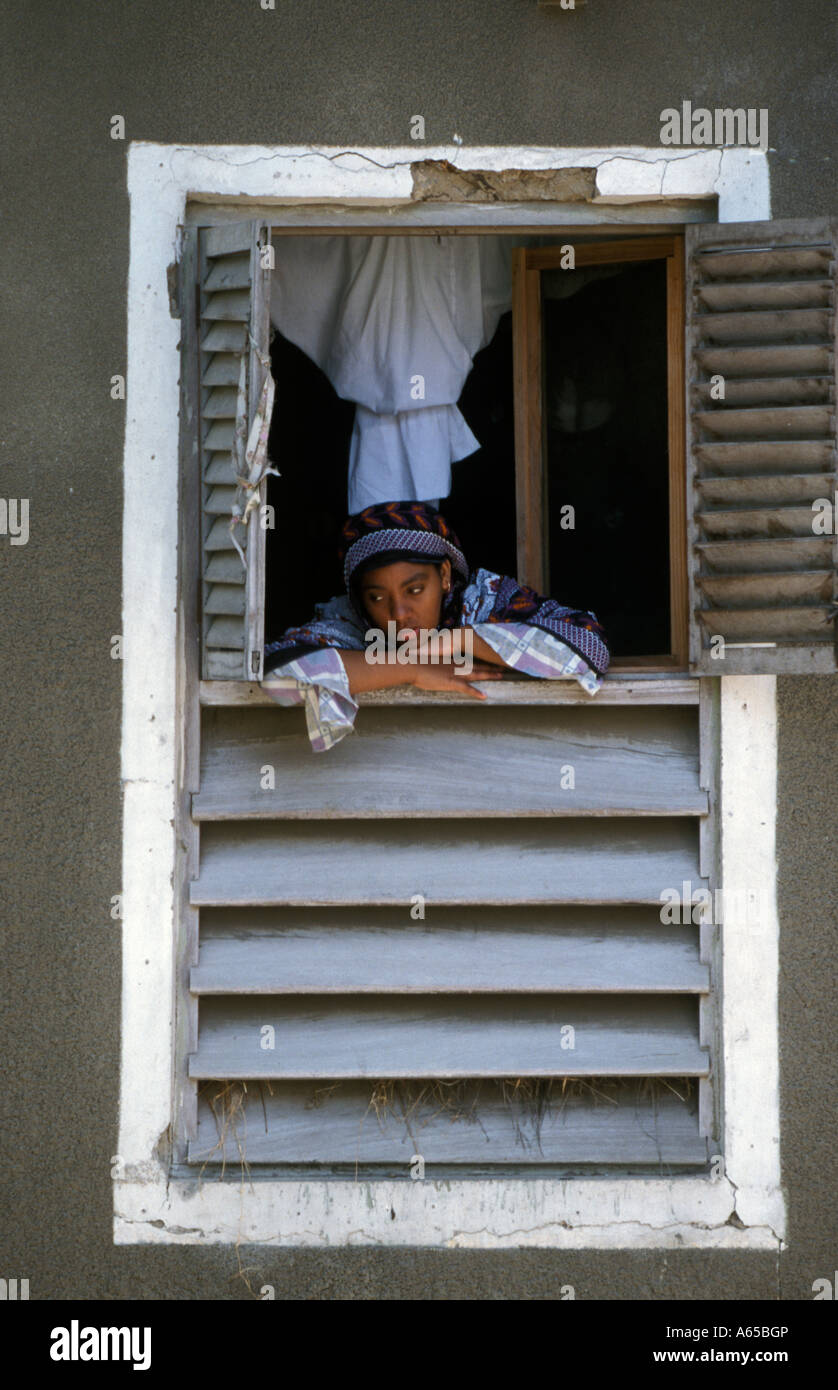 Swahili girl looking out of her window Stone Town Zanzibar Tanzania ...