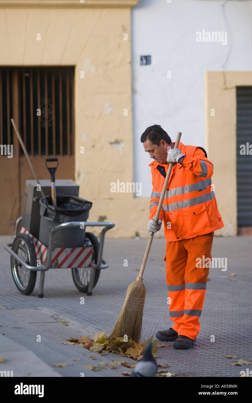 Street sweeper sweeping the streets Stock Photo - Alamy