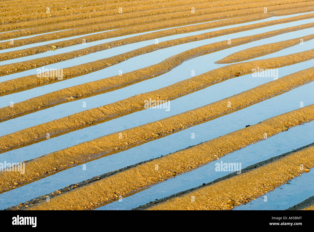 Diagonal sand and water pattern Stock Photo - Alamy