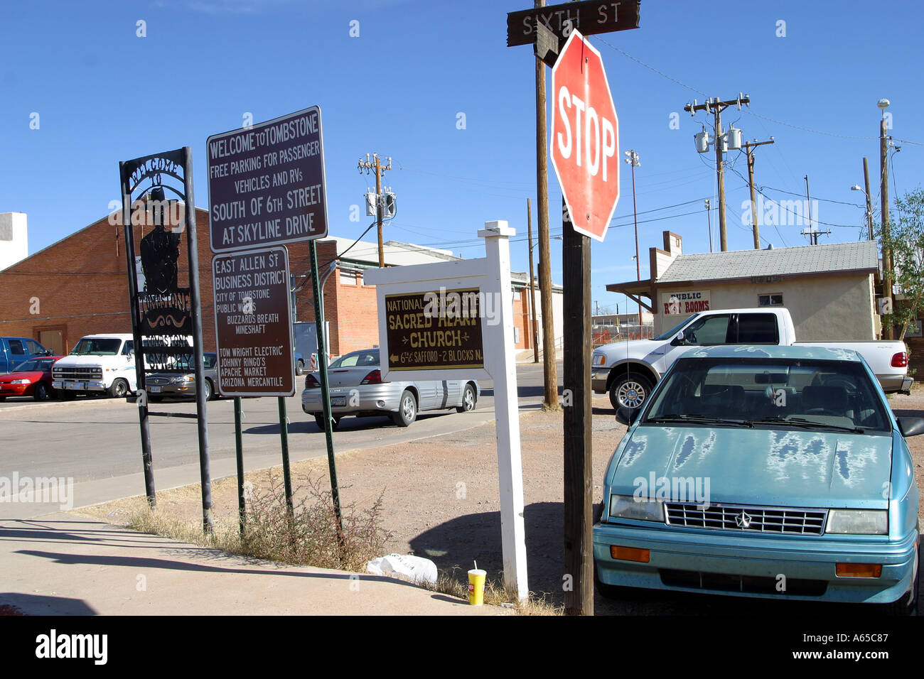 Signs and vehicles Tombstone Arizona USA Stock Photo - Alamy
