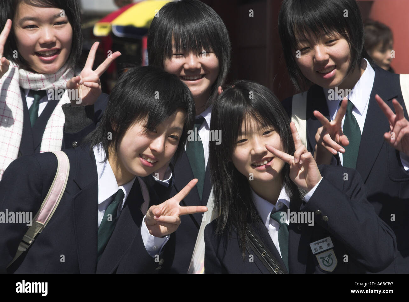 Schoolgirls On Outing Making Rabbit Ears Gesture Asakusa Tokyo Japan