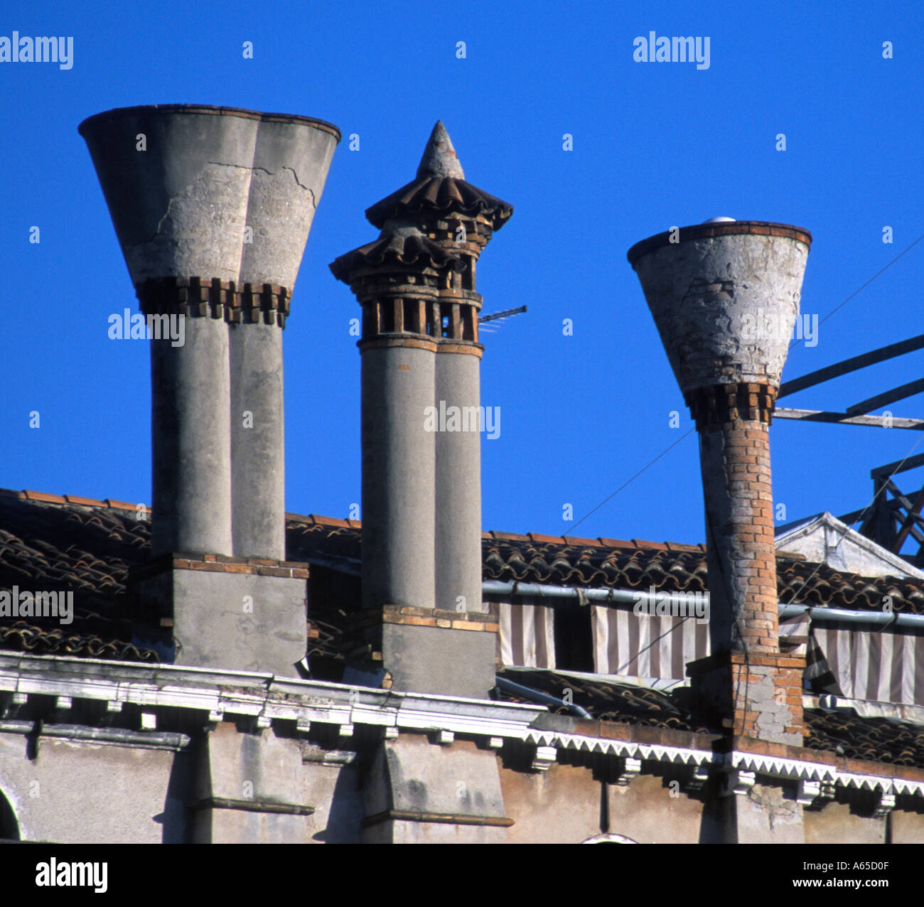Medieval wood burning chimneys Ca Dario Venice Stock Photo - Alamy