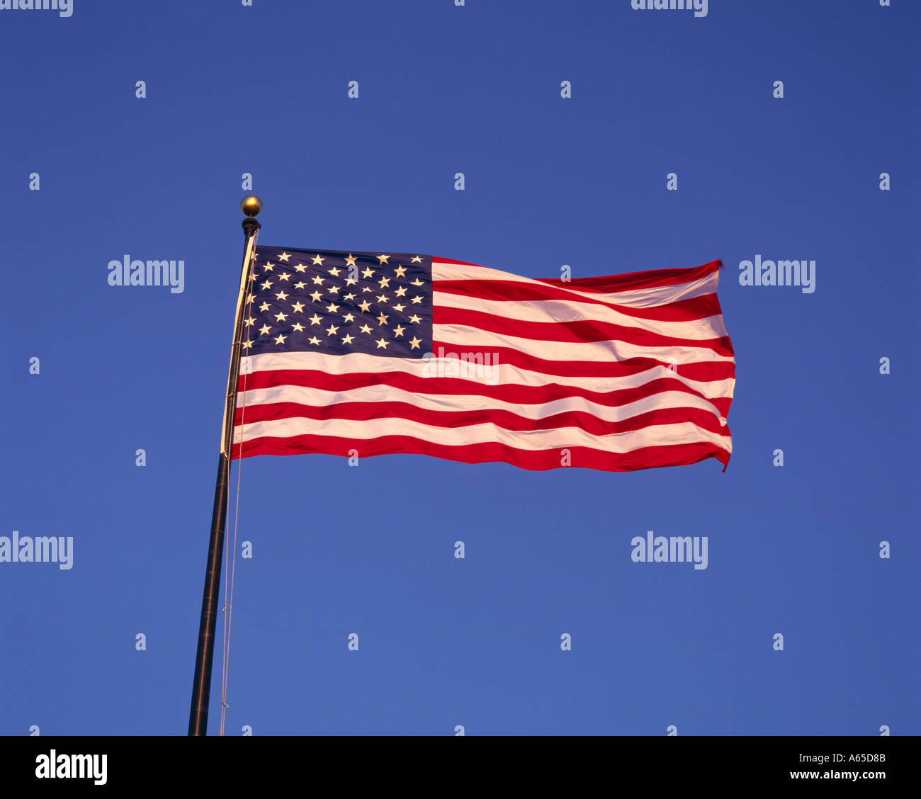 US Flag, blue sky Stock Photo - Alamy