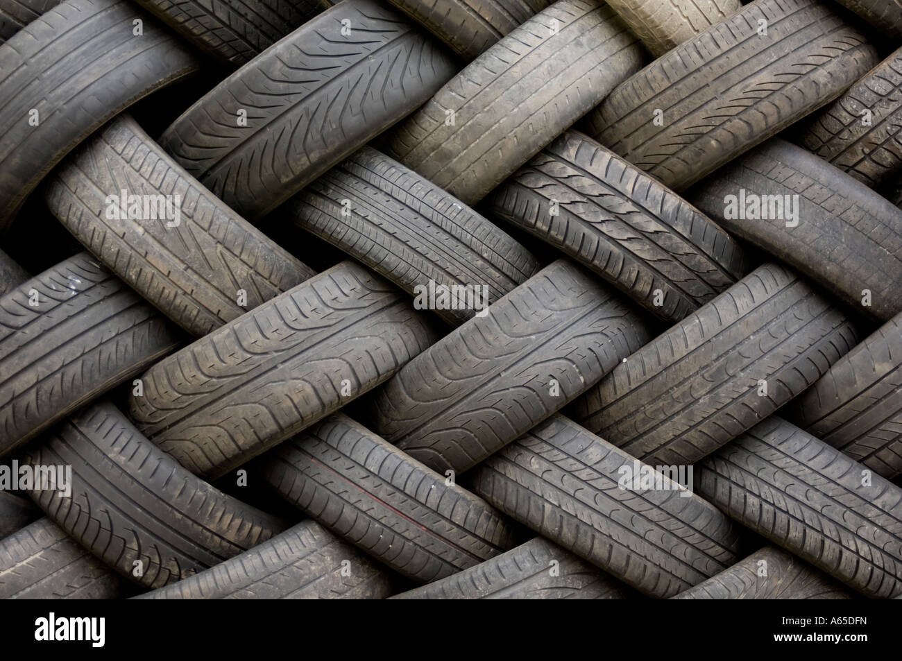 stack of old rubber car tyres awaiting recycling Stock Photo - Alamy