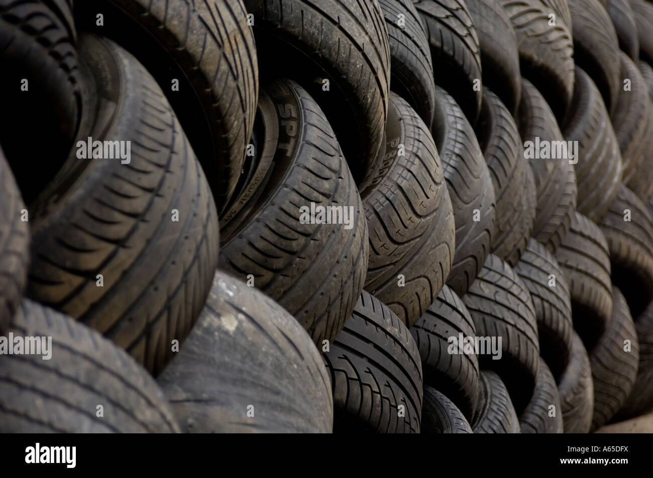 stack of old rubber car tyres awaiting recycling Stock Photo - Alamy