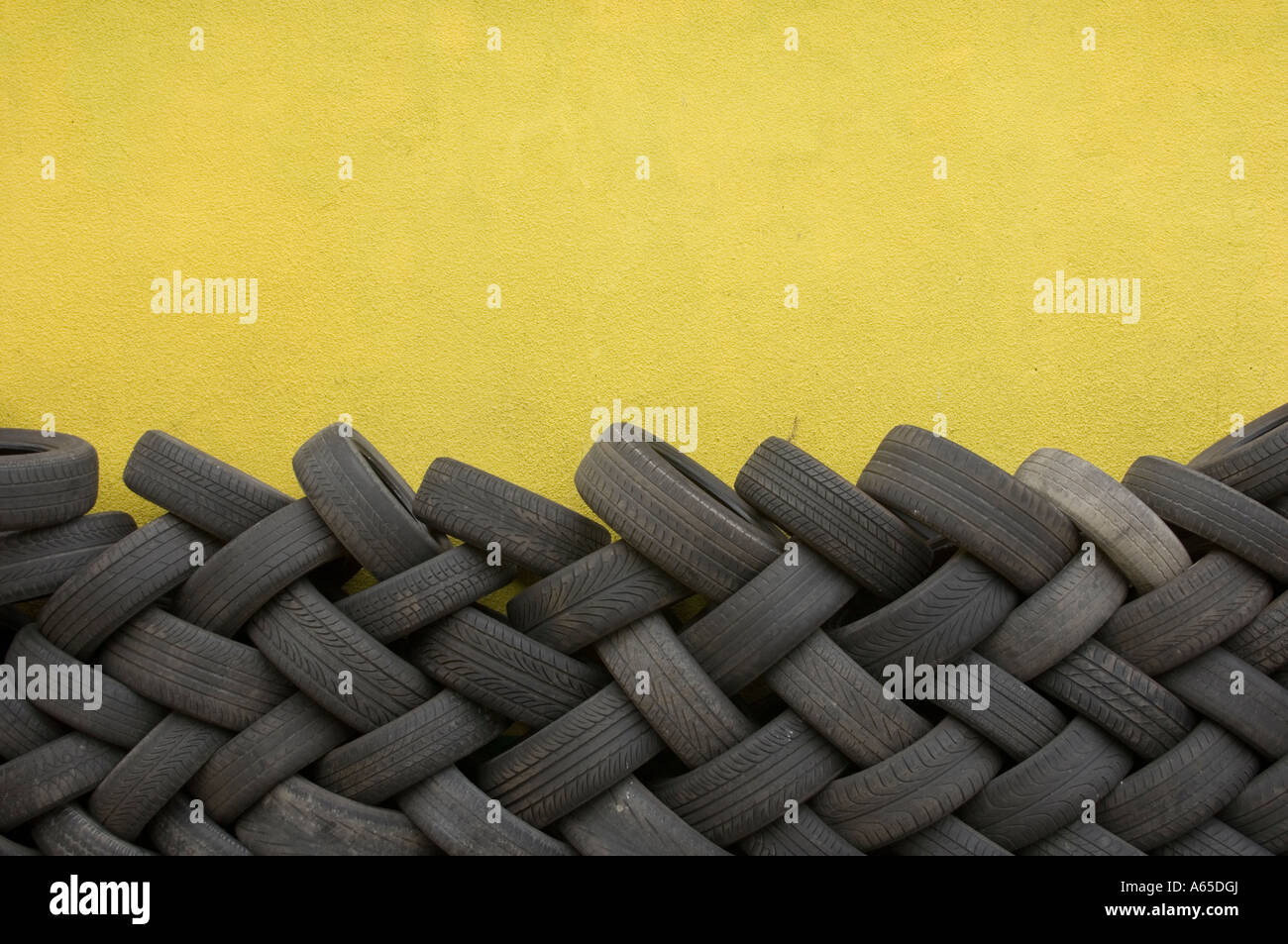 stack of old used rubber car tyres awaiting recycling Stock Photo - Alamy