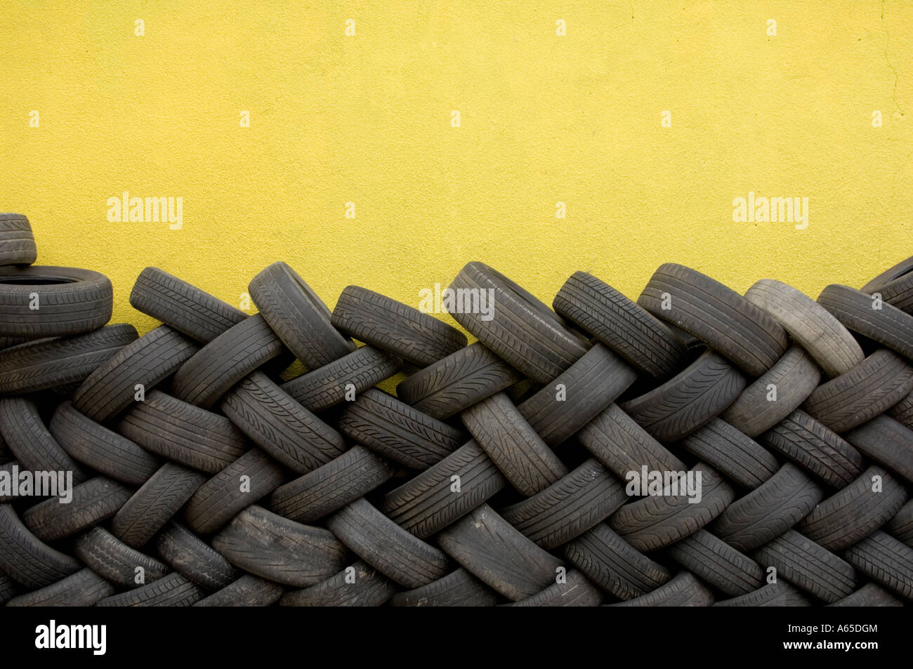 stack of old rubber car tyres awaiting recycling Wales UK Stock Photo ...