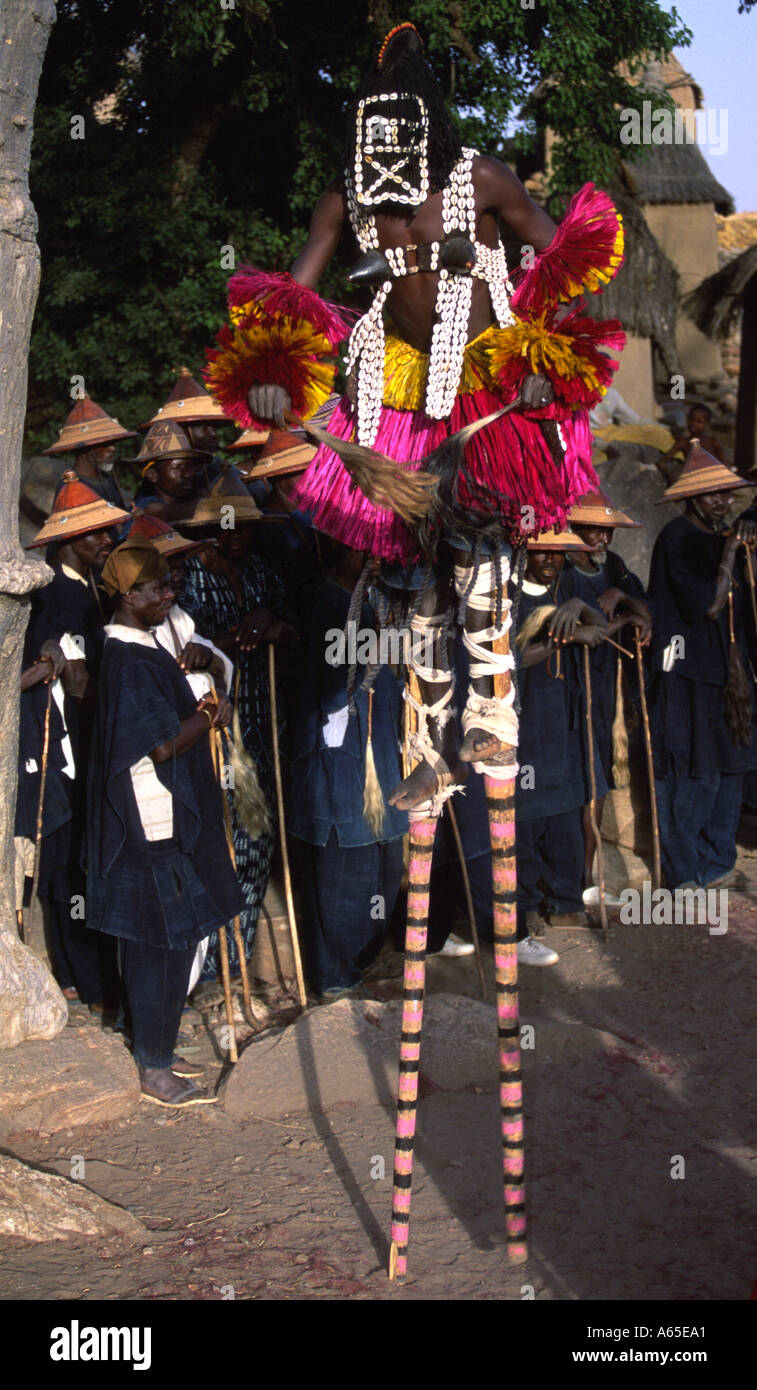 Dogon masked dancer on stilts Tirelli Mali West Africa Stock Photo - Alamy