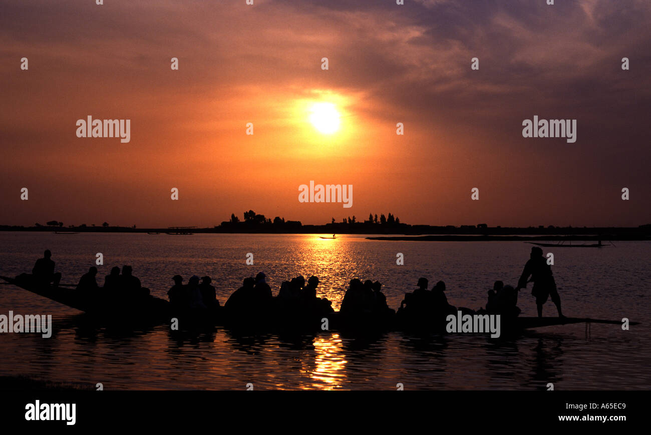 Pirogue boat at sunset on the River Niger Mopti Mali West Africa Stock ...