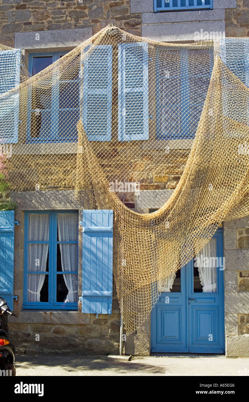 FISHING NETS IN FRONT OF A HOUSE SAINT-SULIAC BRITTANY FRANCE Stock ...