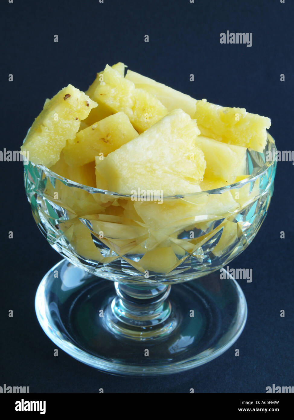 Fresh pineapple chunks in glass dish Stock Photo - Alamy