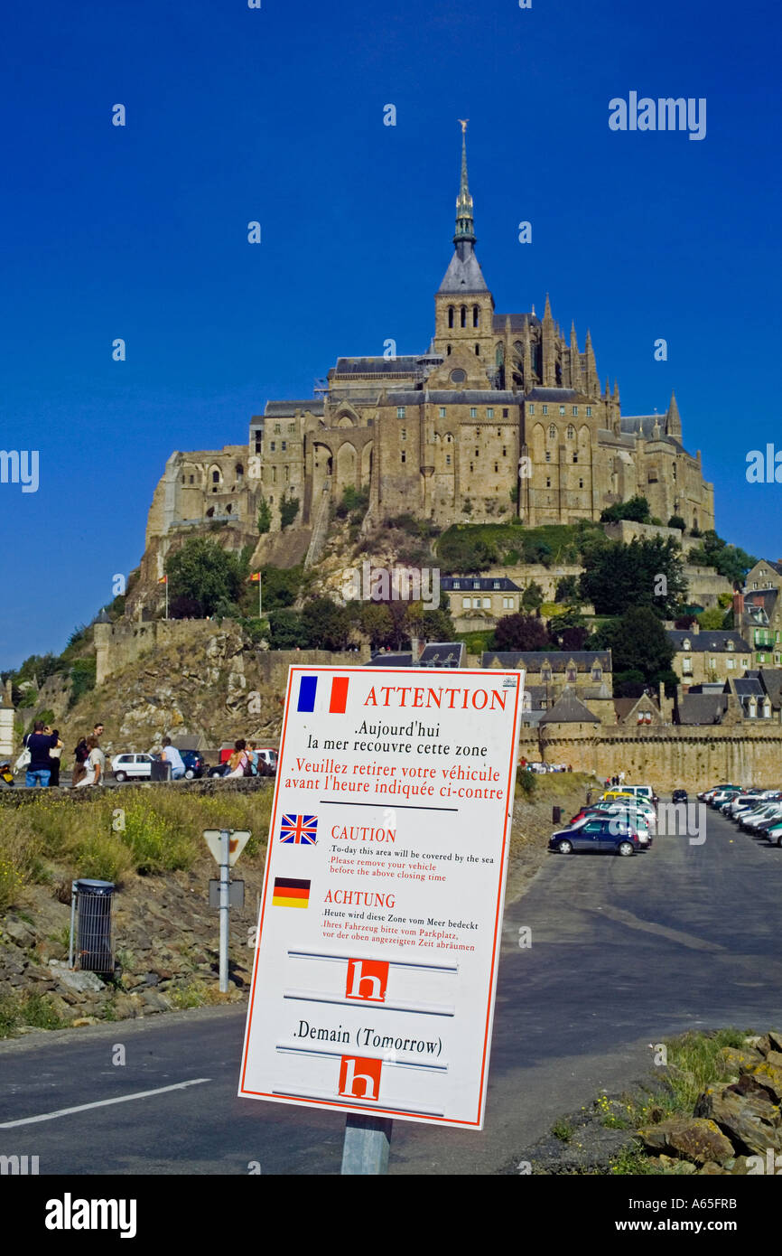 HIGH TIDE WARNING SIGN AND MONT-ST-MICHEL NORMANDY FRANCE Stock Photo ...