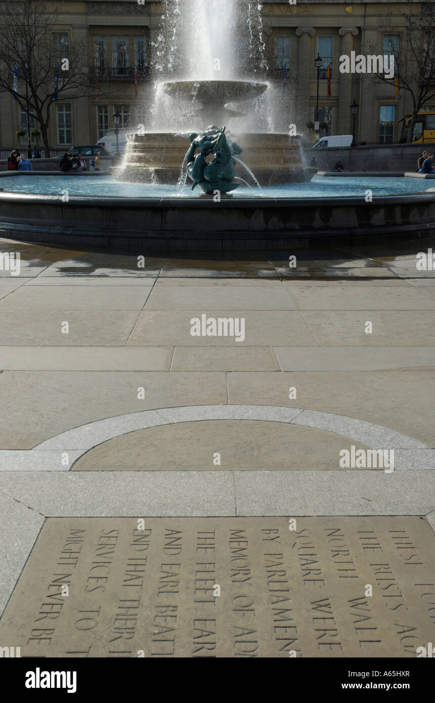 View of Trafalgar Square fountain with memorial paving stone in the ...