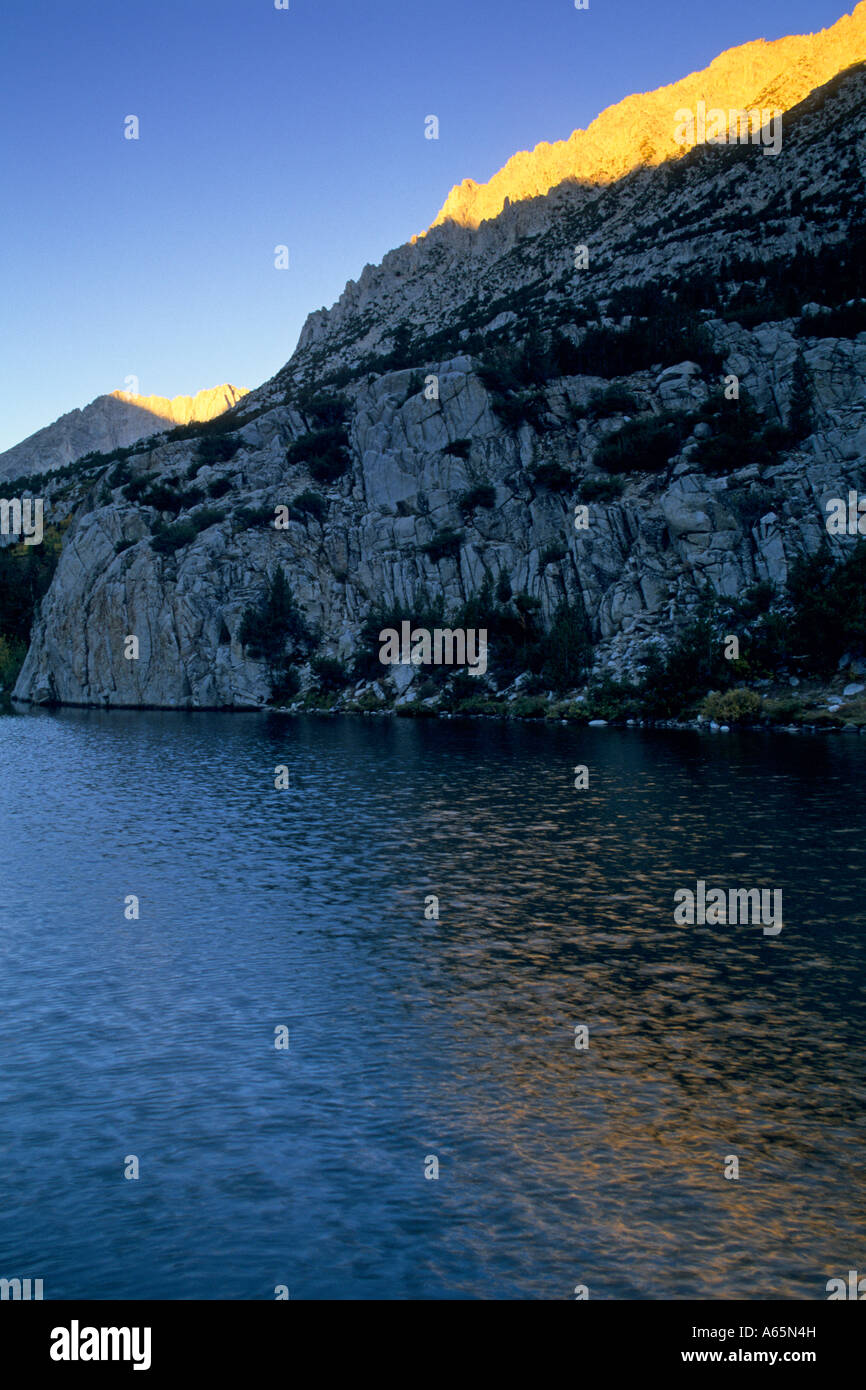Sunrise light on peaks over Mack Lake Little Lakes Valley Inyo County ...