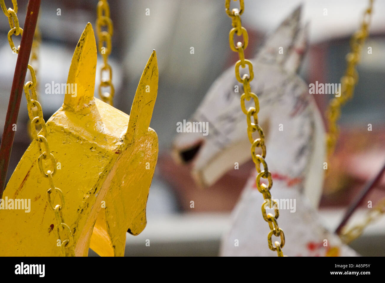 Two horses in a merry go round Stock Photo - Alamy