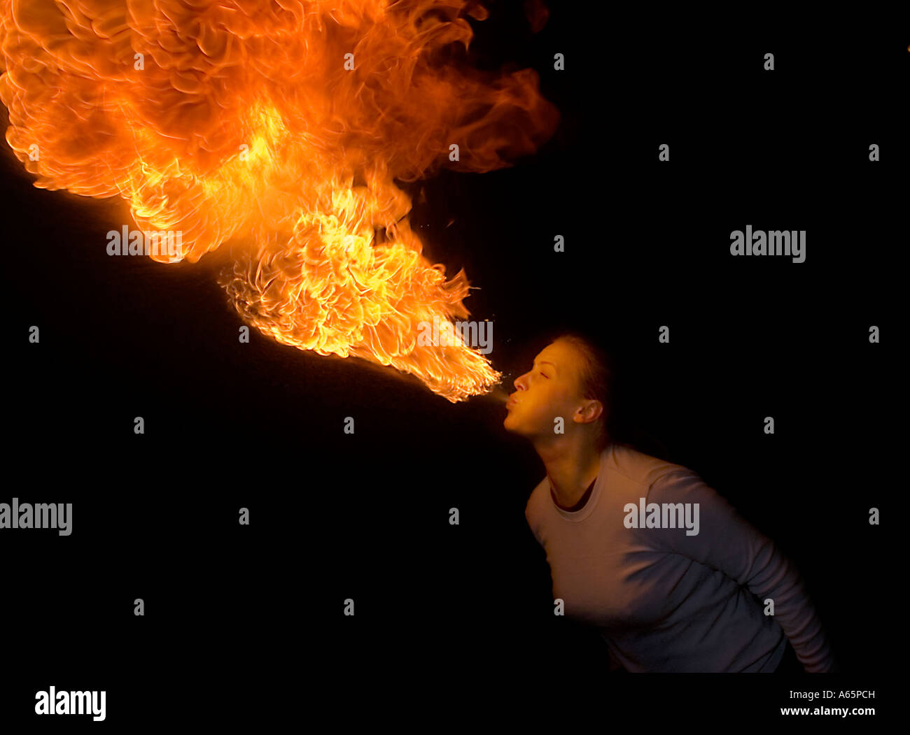 Female fire breather Stock Photo - Alamy