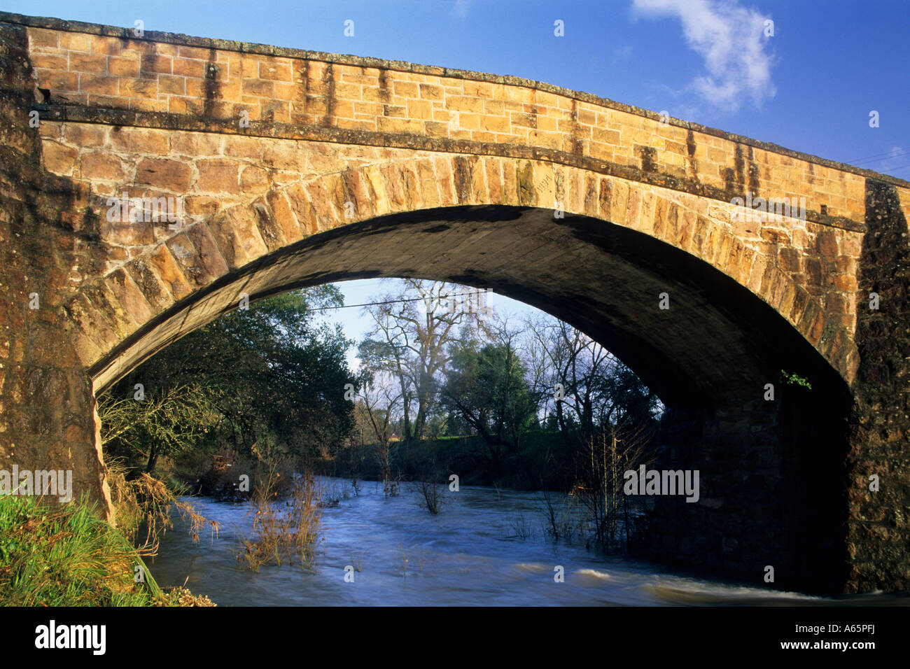 Old stone one lane bridge over the Napa River along the Silverado Trail ...