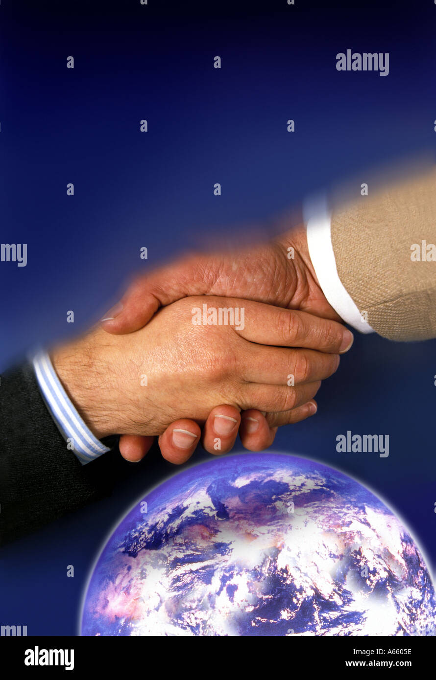 Handshake between two businessmen with Earth in background Stock Photo ...