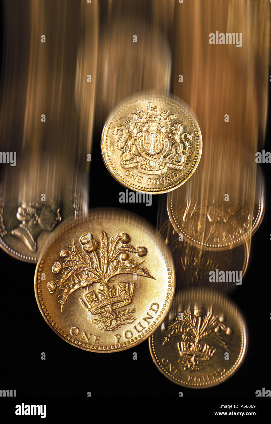 Falling UK Pound coins Stock Photo - Alamy