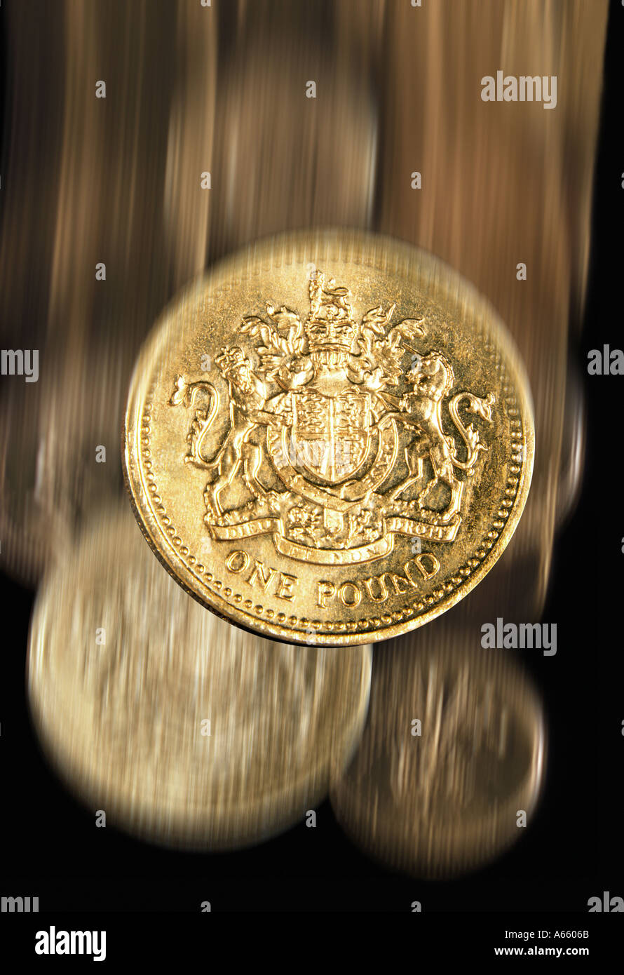 Falling UK Pound coins Stock Photo - Alamy