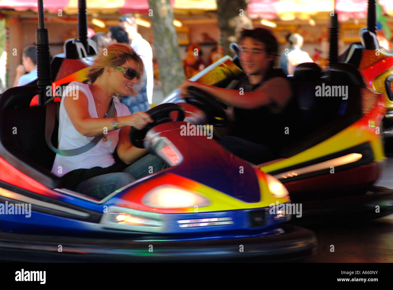 People on a dodgem car ride at the August Bank Holiday fair on ...