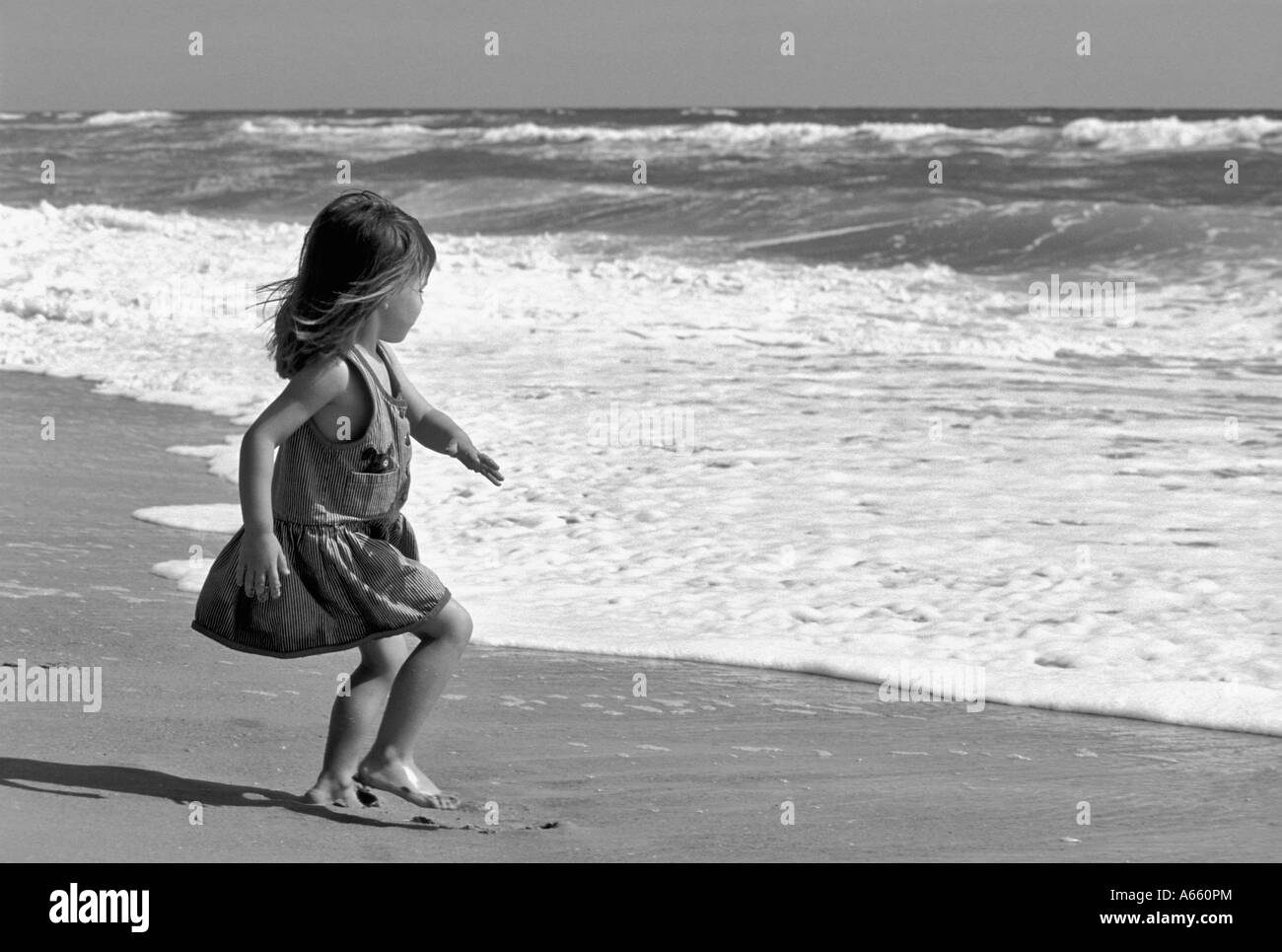Young Girl Running into Ocean Surf Nags Head North Carolina Stock Photo ...
