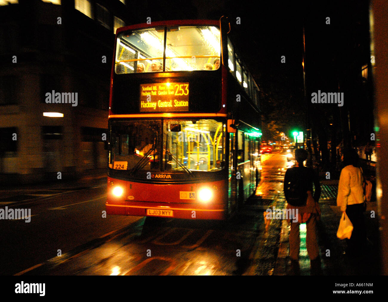 Red double decker bus at night blur image London Stock Photo - Alamy