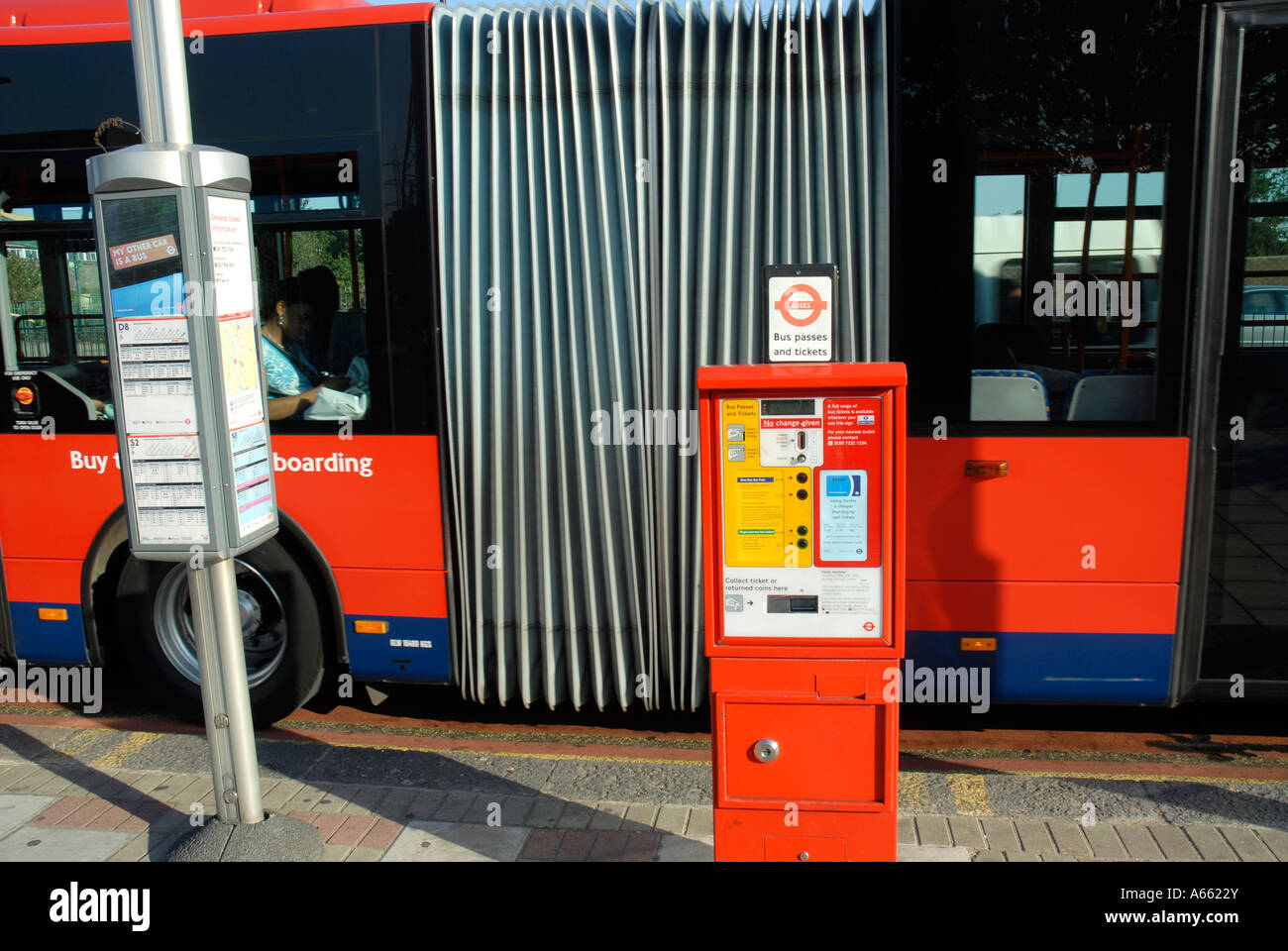 Bus ticket machine and a Bendibus at Stratford London Stock Photo - Alamy