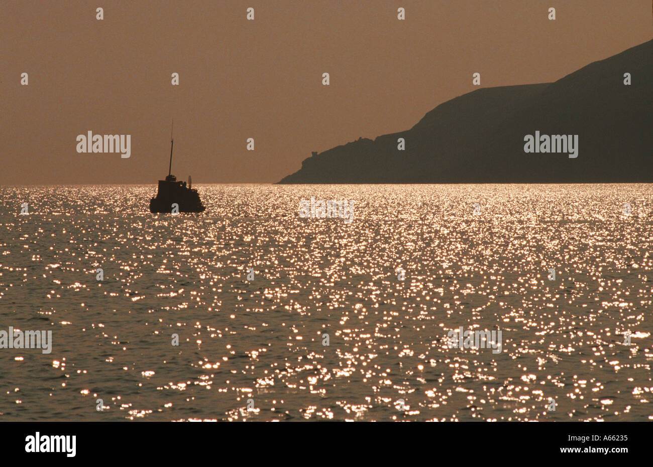 Fishing boat on sparkling sea north east England Stock Photo - Alamy
