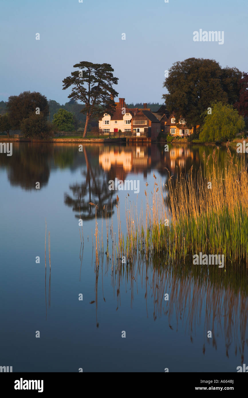 Cottage on lake, Beaulieu, New Forest National Park Stock Photo - Alamy