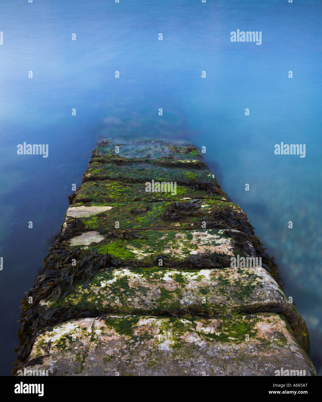 Stone jetty in Swanage harbour, Dorset Stock Photo - Alamy