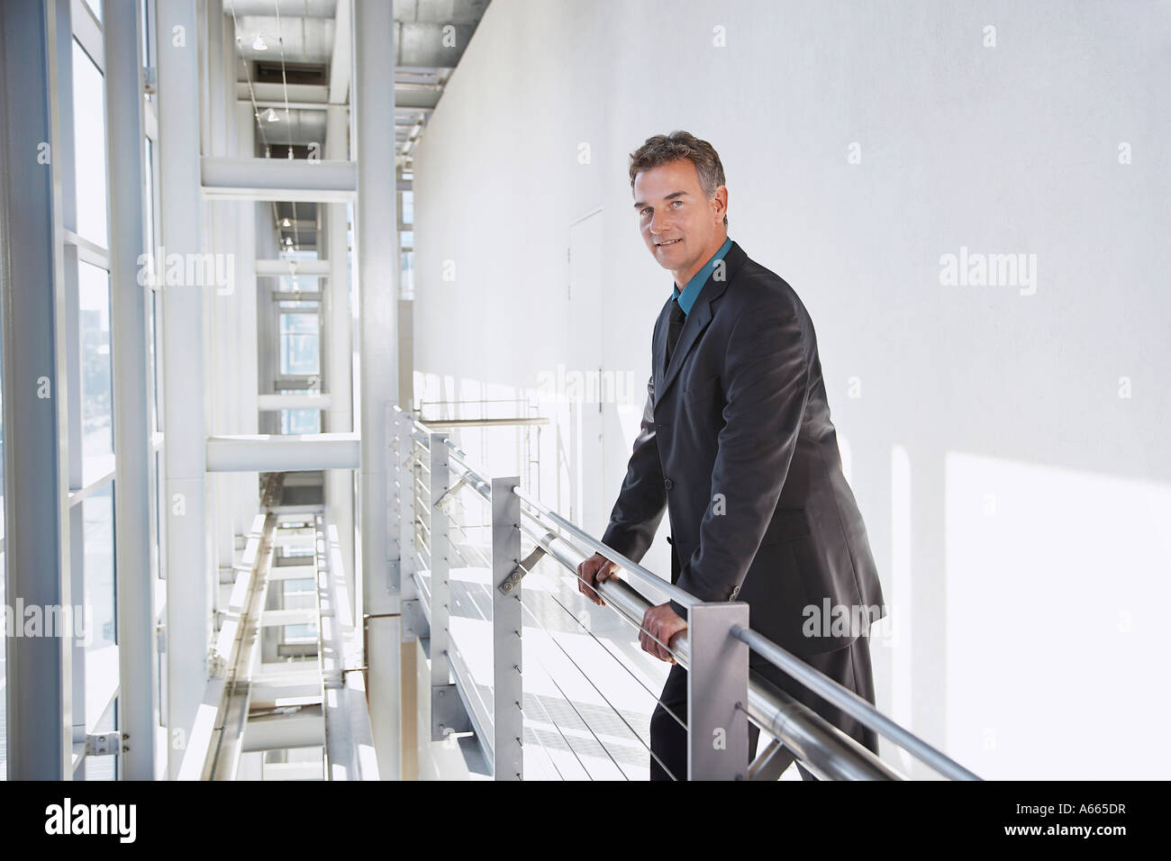Businessman in modern building, portrait Stock Photo - Alamy