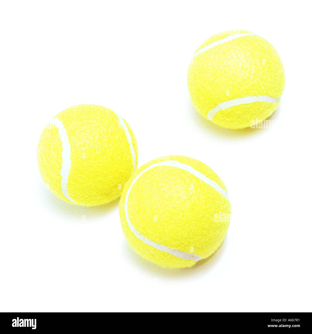 Three tennis balls Stock Photo - Alamy