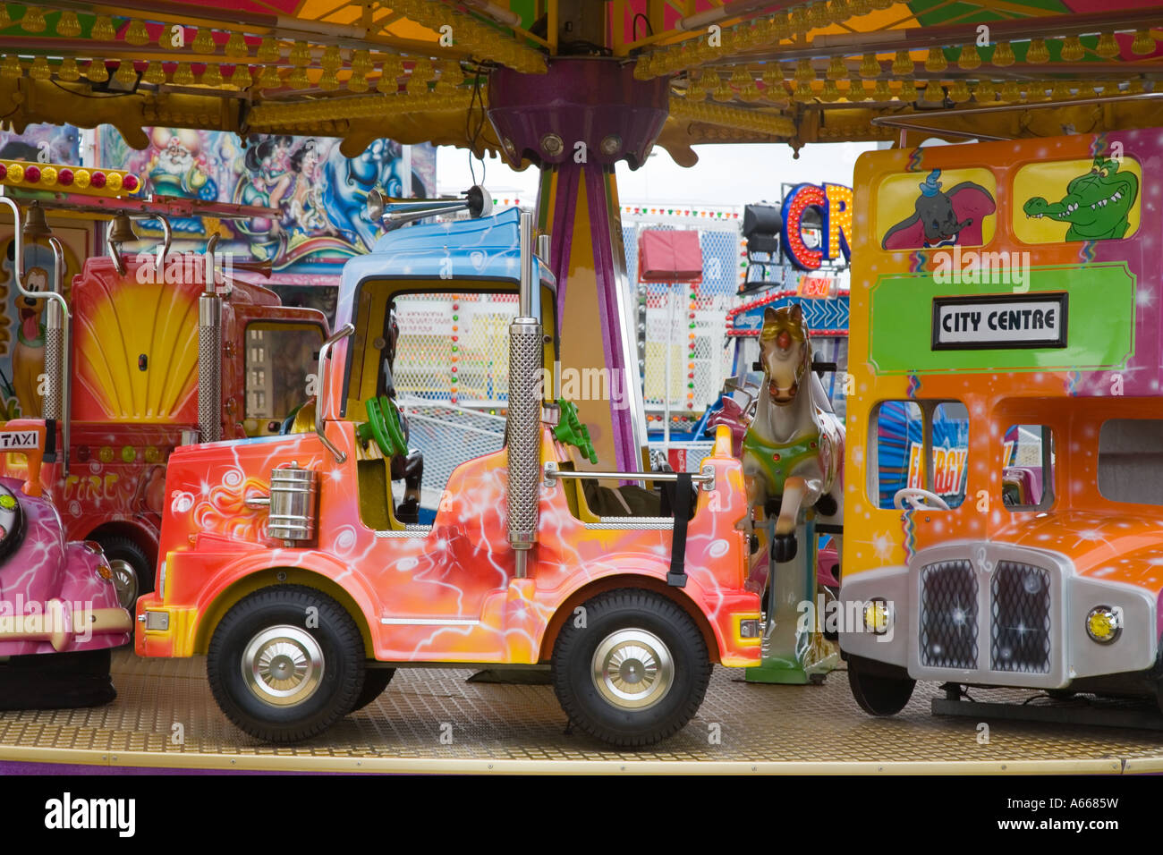 Roundabout kid kids fair hi-res stock photography and images - Alamy