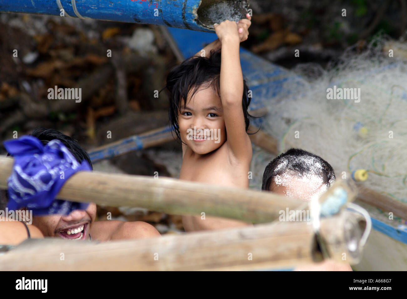 Happy filipino family together smiling hi-res stock photography and ...
