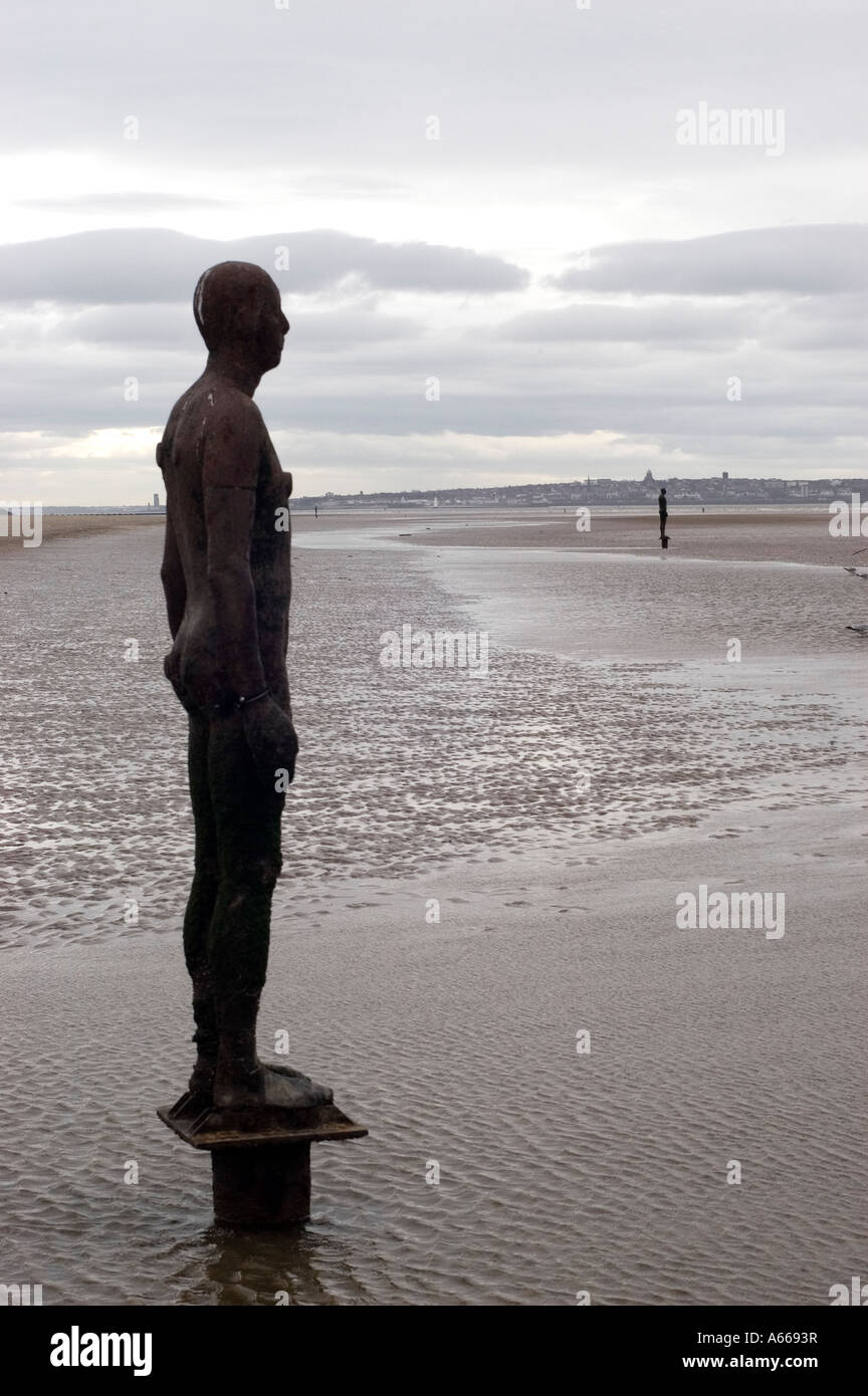 Statue in the Sand Crosby Stock Photo - Alamy