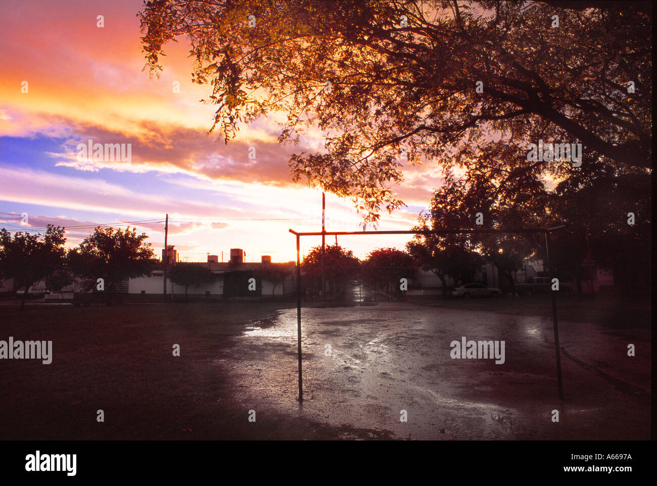 Sunset at the neighborhood square Stock Photo - Alamy