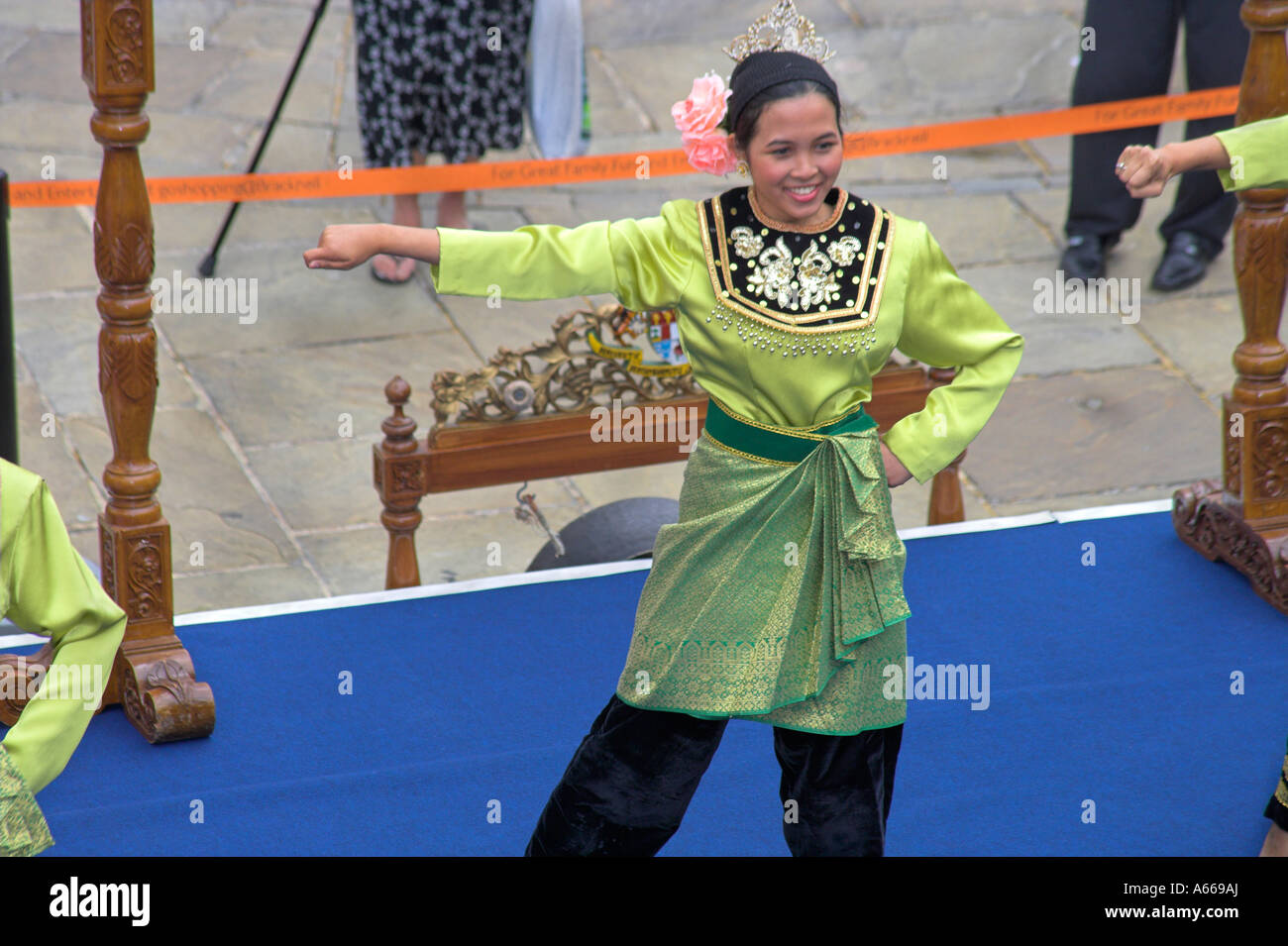 Malaysian girl dancers throwing fists dancing during a demonstration ...